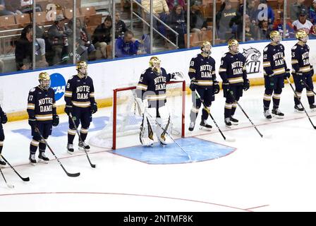 MANCHESTER, NH - MARCH 30: Notre Dame and UMASS shake hands after the ...