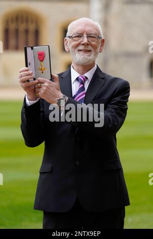 Martyn Butler, (David Hewett) after being made a Officer of the Order ...