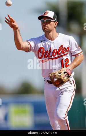 Baltimore Orioles second baseman Adam Frazier throws out Colorado ...