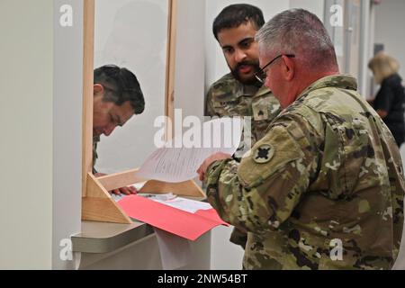 Soldiers are shown processing through the Fort Dix JRC. (Images ...