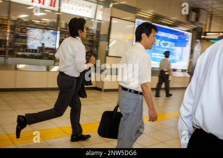 man running,in Shinjuku Railway station.Tokyo city, Japan, Asia Stock ...