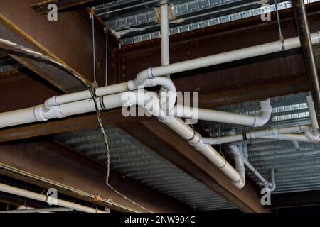Installed PVC water pipes are assembled and laid in trench at ...
