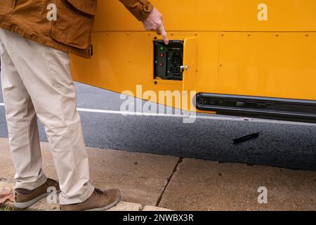 The charging port of a new electric school bus at John Lewis Elementary ...