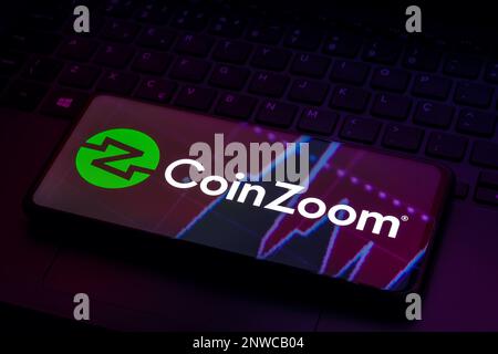 In this photo illustration, the CoinZoom logo seen displayed on a smartphone Stock Photo - Alamy