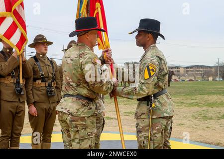Command Sgt. Maj. Loyd Rhoades releases the colors in the formation ...