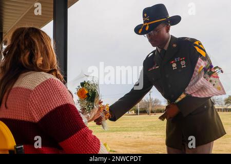 Command Sgt. Maj. Loyd Rhoades releases the colors in the formation ...