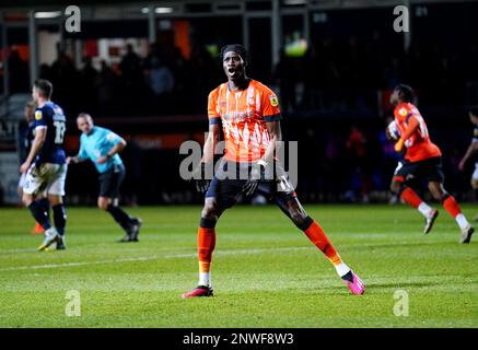 Luton Town's Elijah Adebayo with the match ball after his hat-trick ...