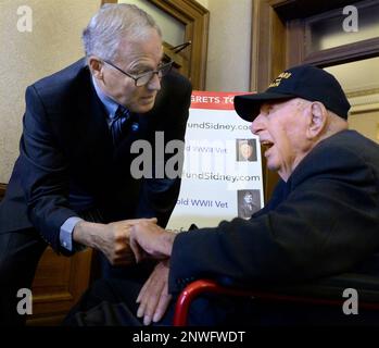 United States Army veteran, Mr. Charles Clymer (left), and Dr. Garland ...