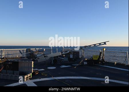 A ScanEagle unmanned aerial system sits on the flight deck of USCGC ...