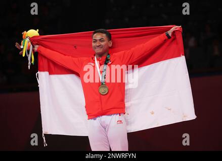 Indonesia's Ahmad Zigi ZARESTA YUDA reacts after performing the Karate ...