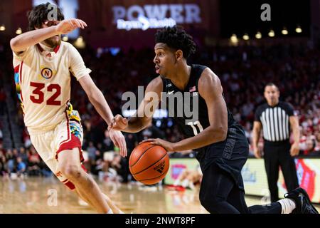 Nebraska's Wilhelm Breidenbach (32) drives between Arkansas-Pine Bluff ...
