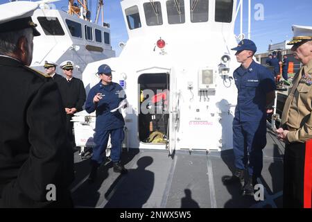 U.S. Coast Guard Capt. Douglas Stark, right, Maritime Security Response ...