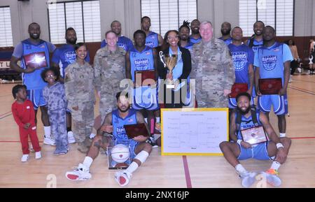 Command Sgt. Maj. Tamisha A. Love (center), Fort Lee garrison command ...