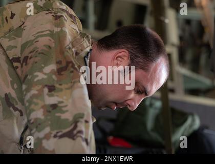 Aircrew from the 43rd Electronic Combat Squadron walk towards an EC ...