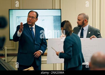 Larry Peterson, a GBI forensic investigator, testifies about photos ...