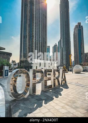 Dubai Opera house Sign in Downtown Dubai, surrounded by skyscrapers and ...