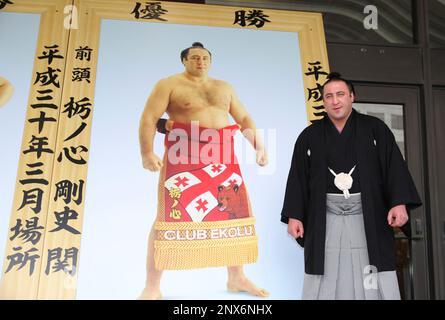 Georgia-born sekiwake Tochinoshin poses for photographers in front of ...