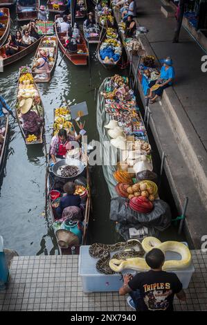 "Floating market Thailand" Snake python on the shoulder of a lady in ...