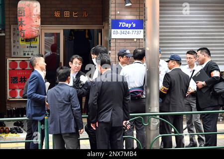The Metropolitan Police Department officers conduct an investigation a ...