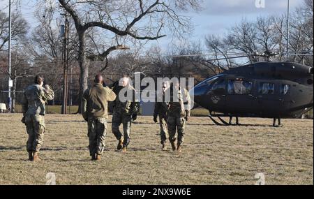 COL Brian Jacobs, USAG Fort Hamilton Commander, salutes the helicopter ...