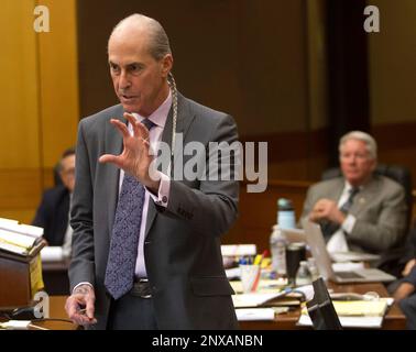 Defense attorney Bruce Harvey ask questions of Detective Darrin Smith ...