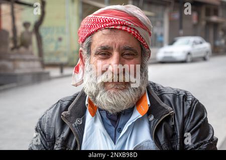 1 old Kurdish man with a very long beard and traditional Kurdish ...