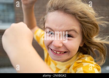 Kid boy with angry expression. Angry hateful little aggression boy ...