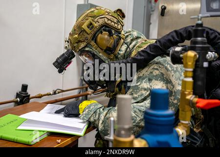 A Soldier assigned to the 56th Chemical Reconnaissance Detachment (CRD ...