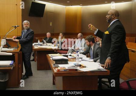 Prosecutor Clint Rucker, right, states his closing argument Tuesday ...
