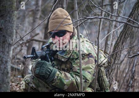 Sgt. 1st Class John Imhoff, an Observer, Coach, and Trainer assigned to ...