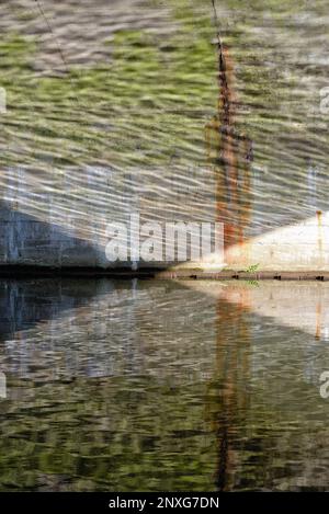 Water surface with ripples and sunlight reflections. Beautiful ...