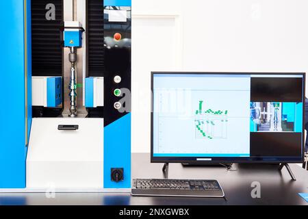 Systems for optical shaft measurement with control monitor Stock Photo ...