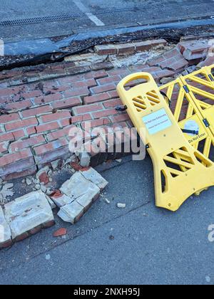 A Broken Wall in A Carpark Been Hit by a Car With Warning Barrier ...