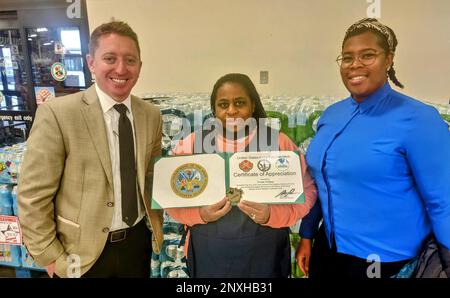 Mr. Trevor Loew MWR Director, USAG Fort Hamilton (L), recognized Mrs ...
