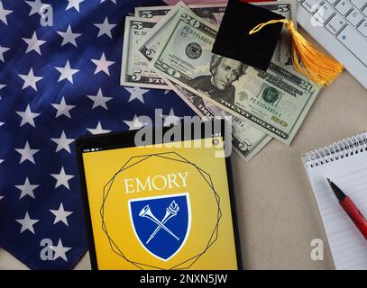 In this photo illustration, the Emory University logo seen displayed on ...