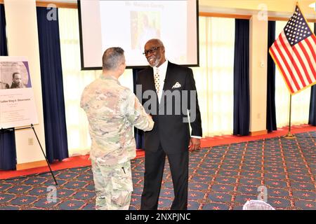 Guest speaker Marcus Gentry receives a special appreciation plaque from ...