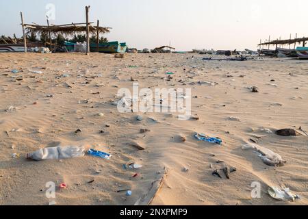 Plastic and other trash litters an area of Negombo Beach, Sri Lanka ...