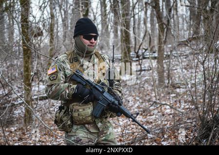 Staff Sgt. Joseph Medina, an Observer, Coach, and Trainer assigned to ...