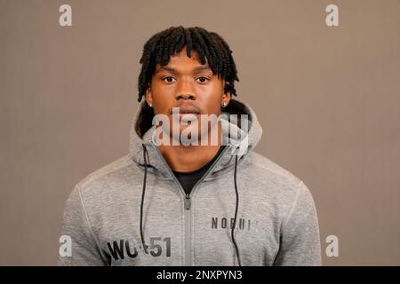 Virginia wide receiver Dontayvion Wicks runs a drill at the NFL ...