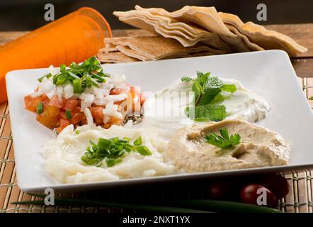 hommos, labneh, chancliche, garlic paste, arab food Stock Photo - Alamy