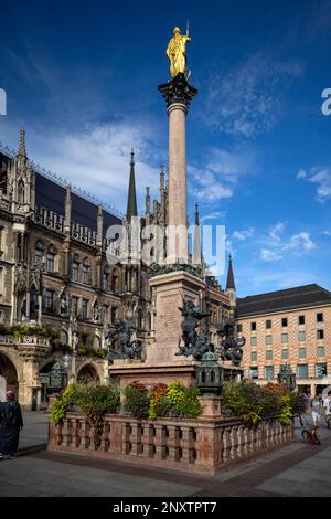 The statue of Mary and a clock on the Gothic facade of the Strasbourg ...