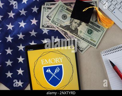 In this photo illustration, the Emory University logo seen displayed on ...