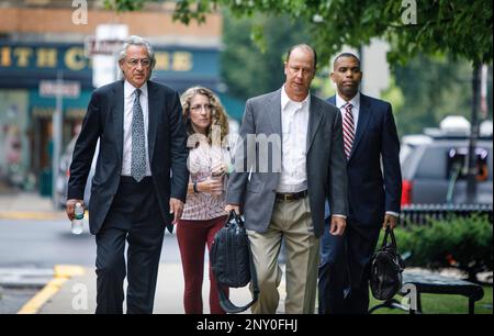 Attorney Tom Kline, left, and Evelyn and James Piazza, third from left ...