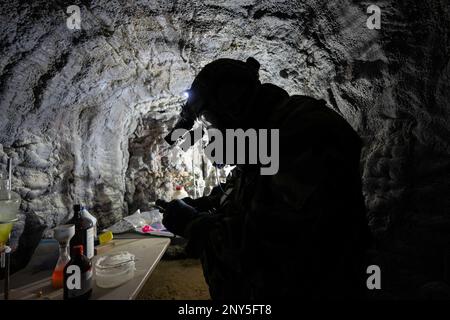 A Soldier assigned to the 5th Special Forces Group (Airborne) swings ...