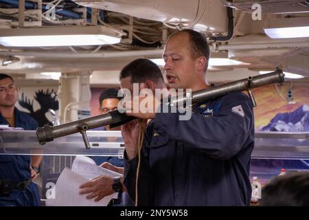 SINGAPORE (Feb. 23, 2023) – Damage Controlman 2nd Class Eli Johnson ...