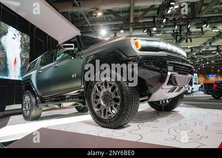 GMC Hummer EV in dark gray, on display at a car show Stock Photo - Alamy