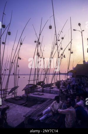 Akash Deep Oil Lamps in wicker baskets suspended on bamboo poles are ...
