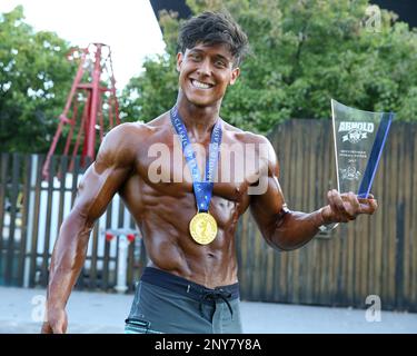 Florian Wolf, of Germany, wins the IFBB Amateur Mens Physique ...