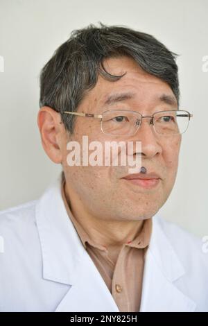 Professor Tsutomu Miyasaka speaks during an interview at Toin University of Yokohama in Kanagawa ...