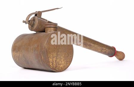 Old brass insecticide spray on a white background Stock Photo - Alamy